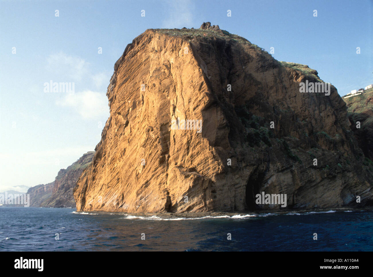 A dramatic sheer cliff face on the coast of Madeira island Portugal ...