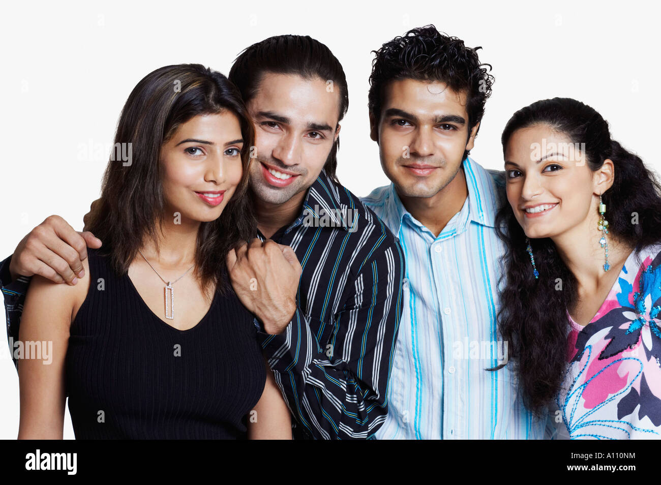 Portrait of two young couples smiling Stock Photo - Alamy