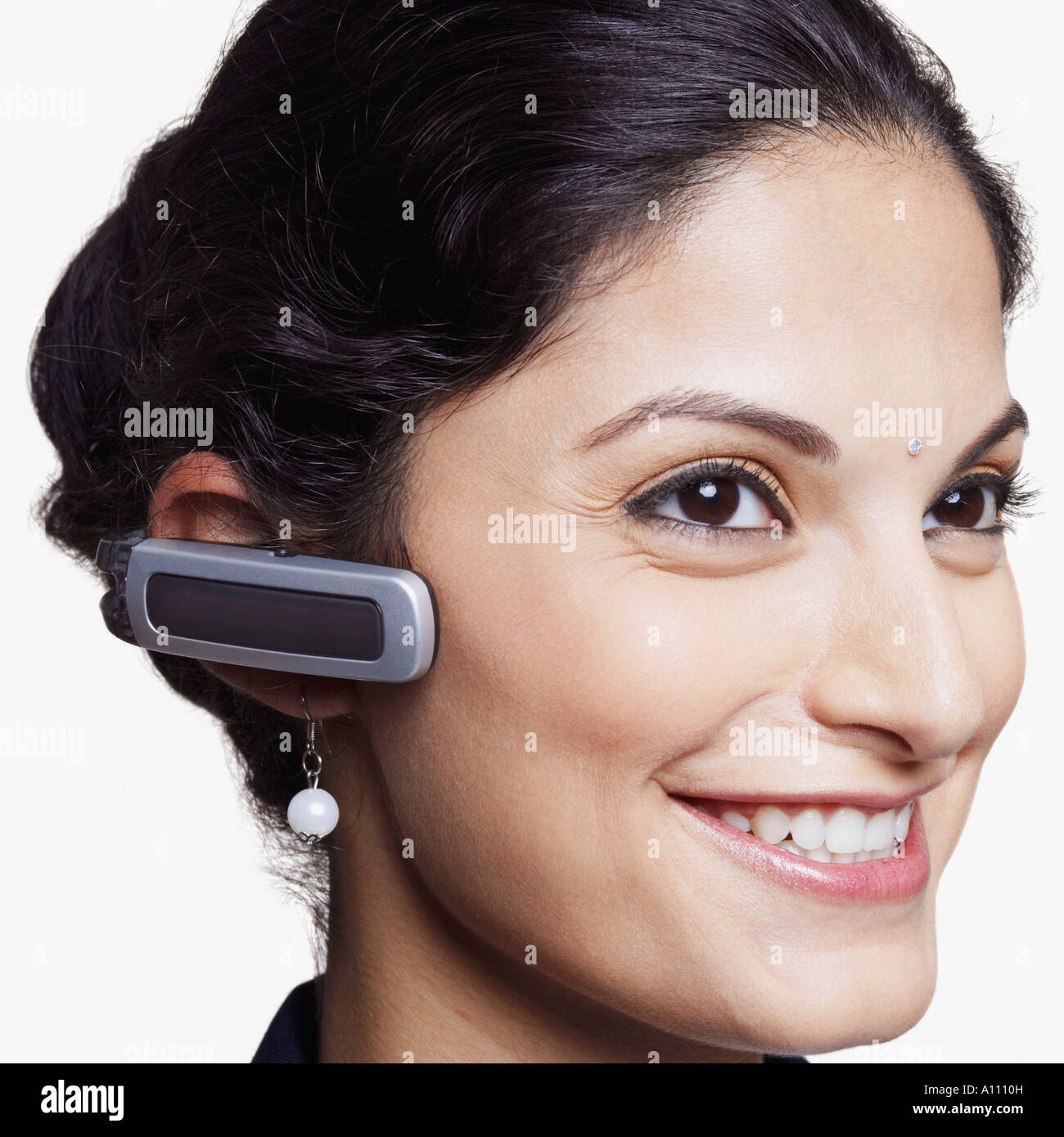 Businesswoman wearing hands free device hi-res stock photography and ...