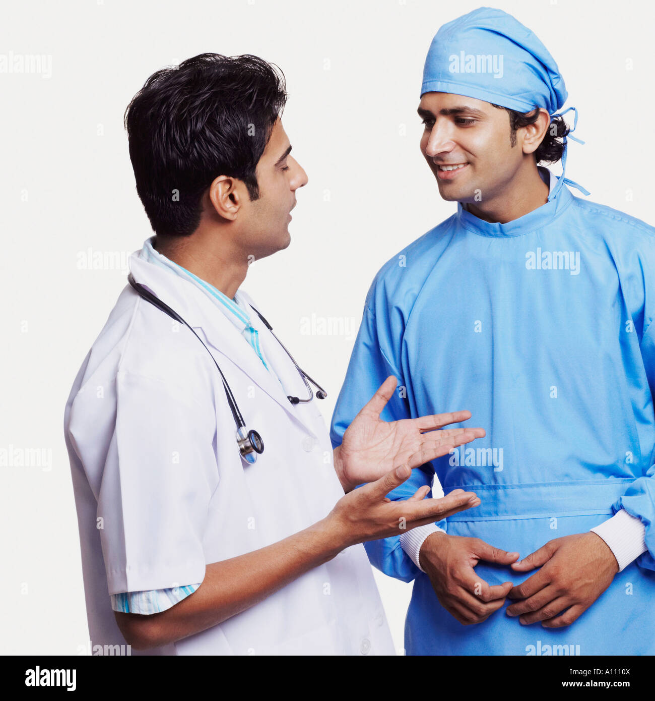 Close-up of two male doctors discussing Stock Photo - Alamy