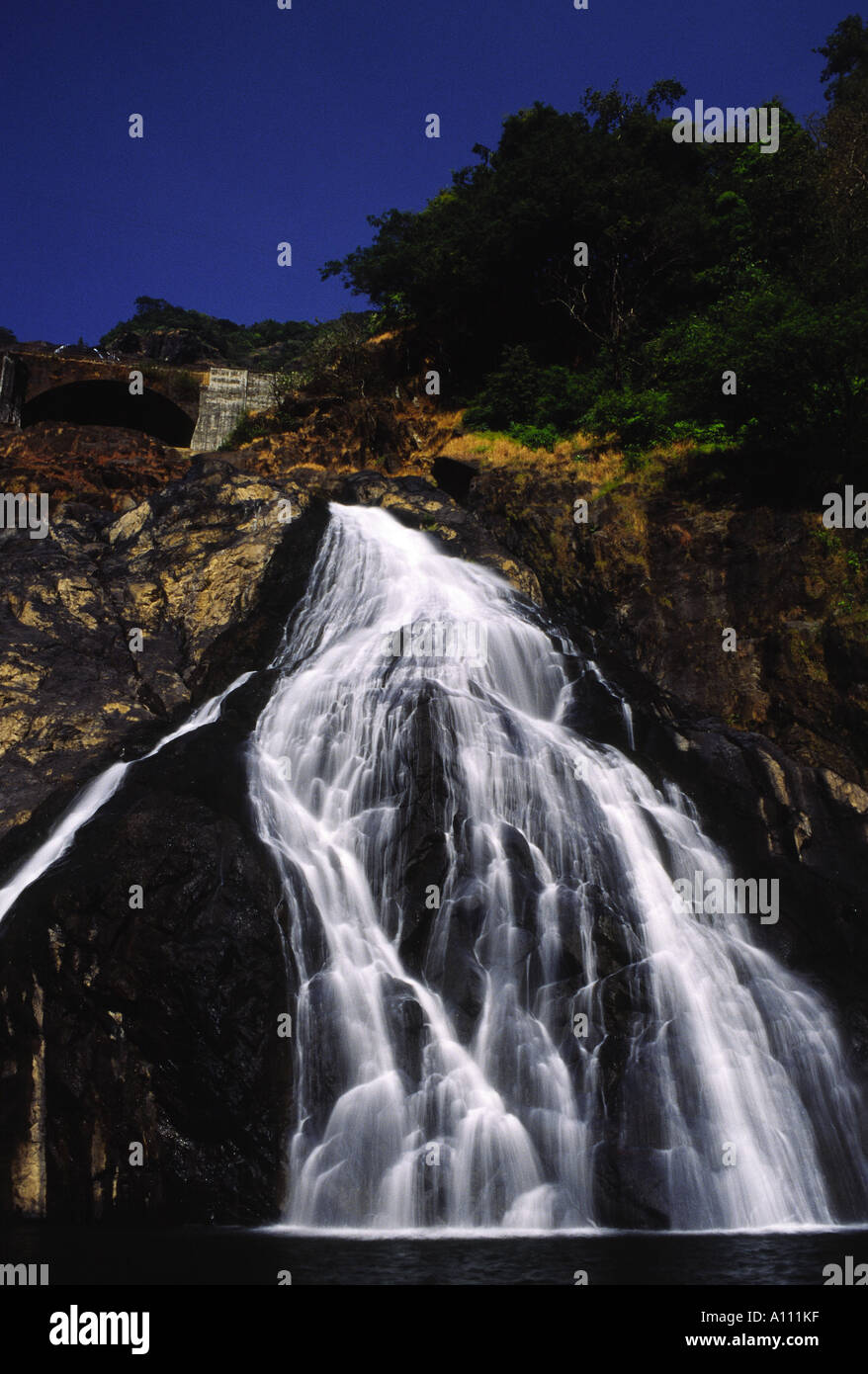 View of the Dudhsagar Falls in East Goa South India Stock Photo - Alamy