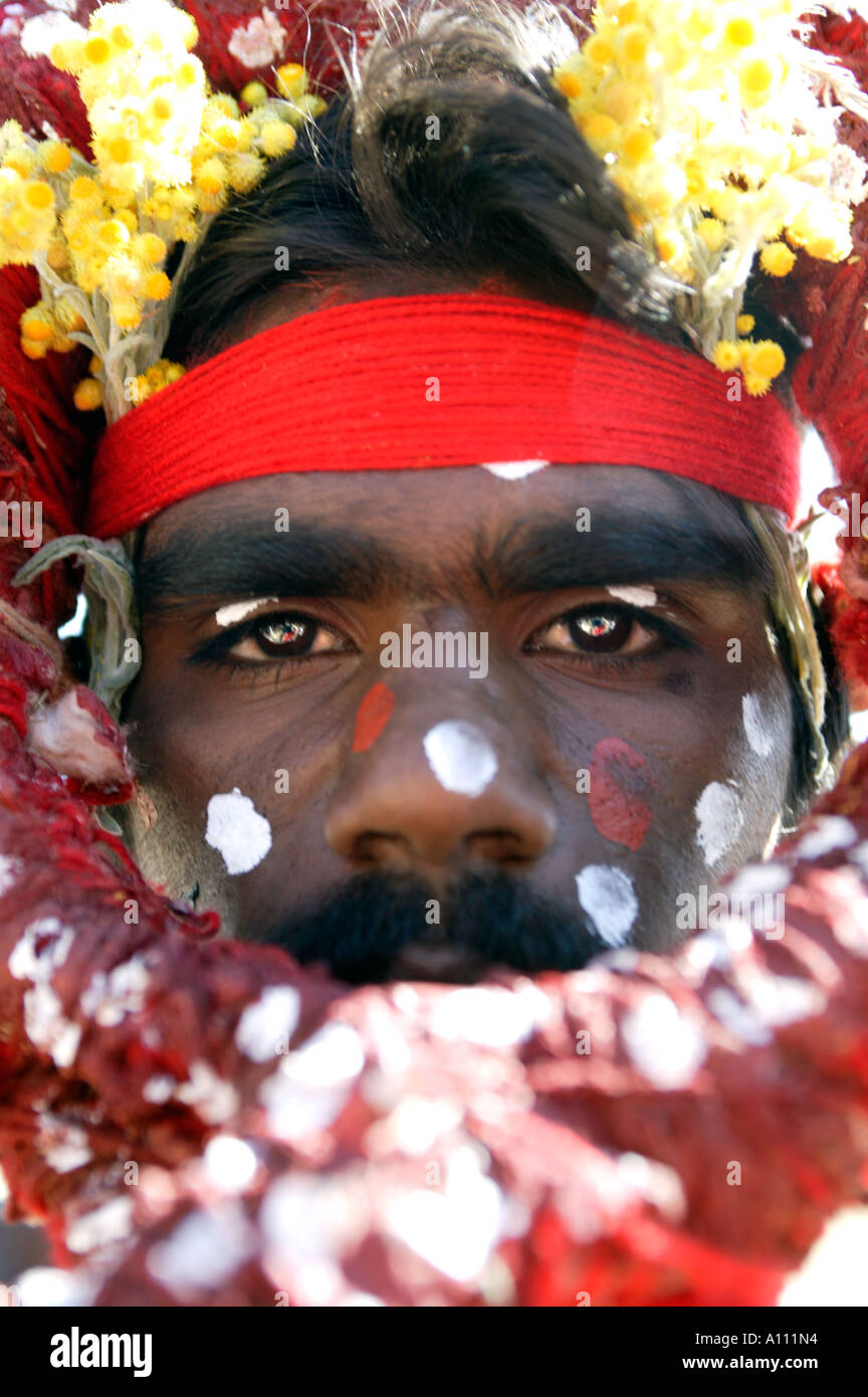 Aboriginal man dressed in traditional costume near Ayers Rock Anangu ...