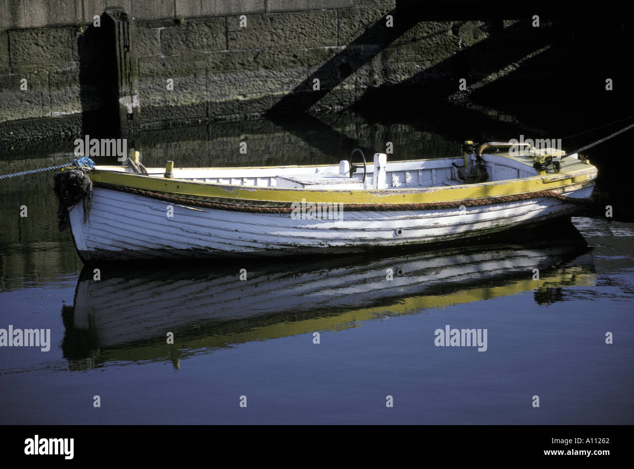 Old white rowing boat Stock Photo - Alamy