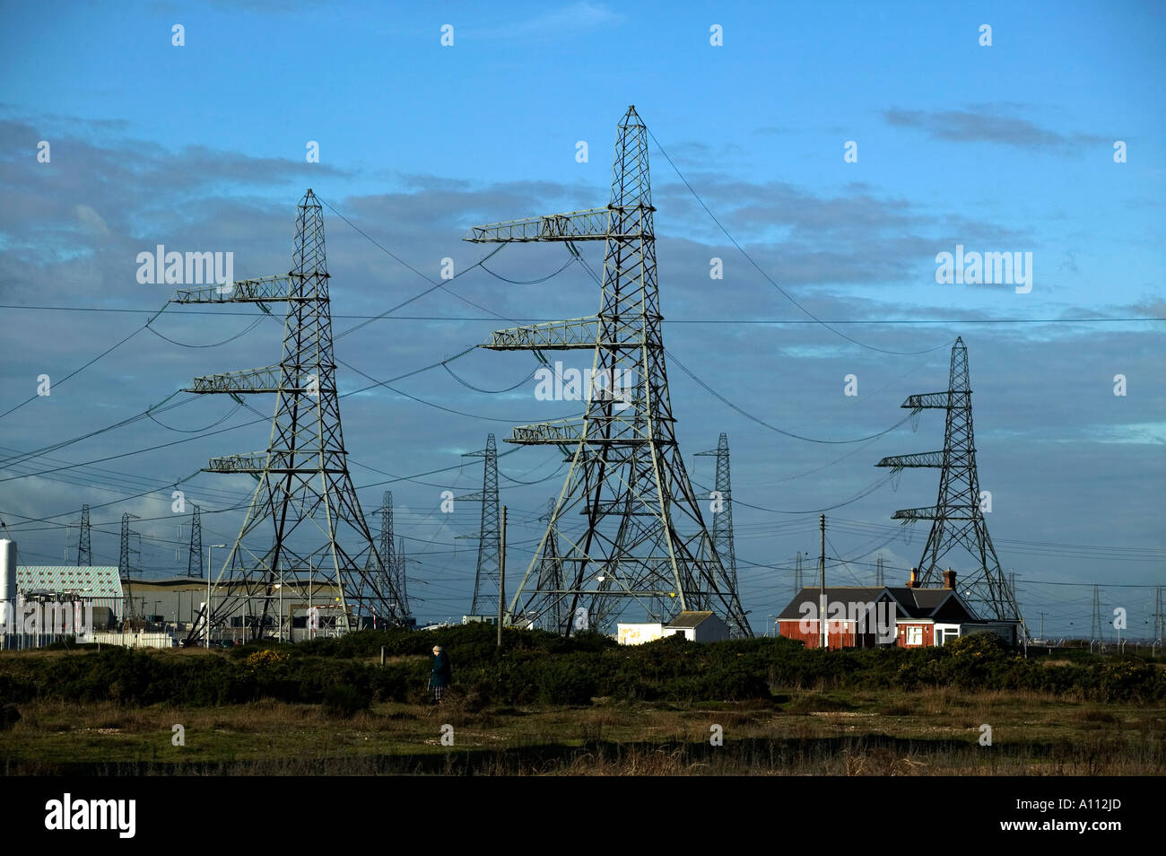 Dungeness power station electricity pylons hi-res stock photography and ...
