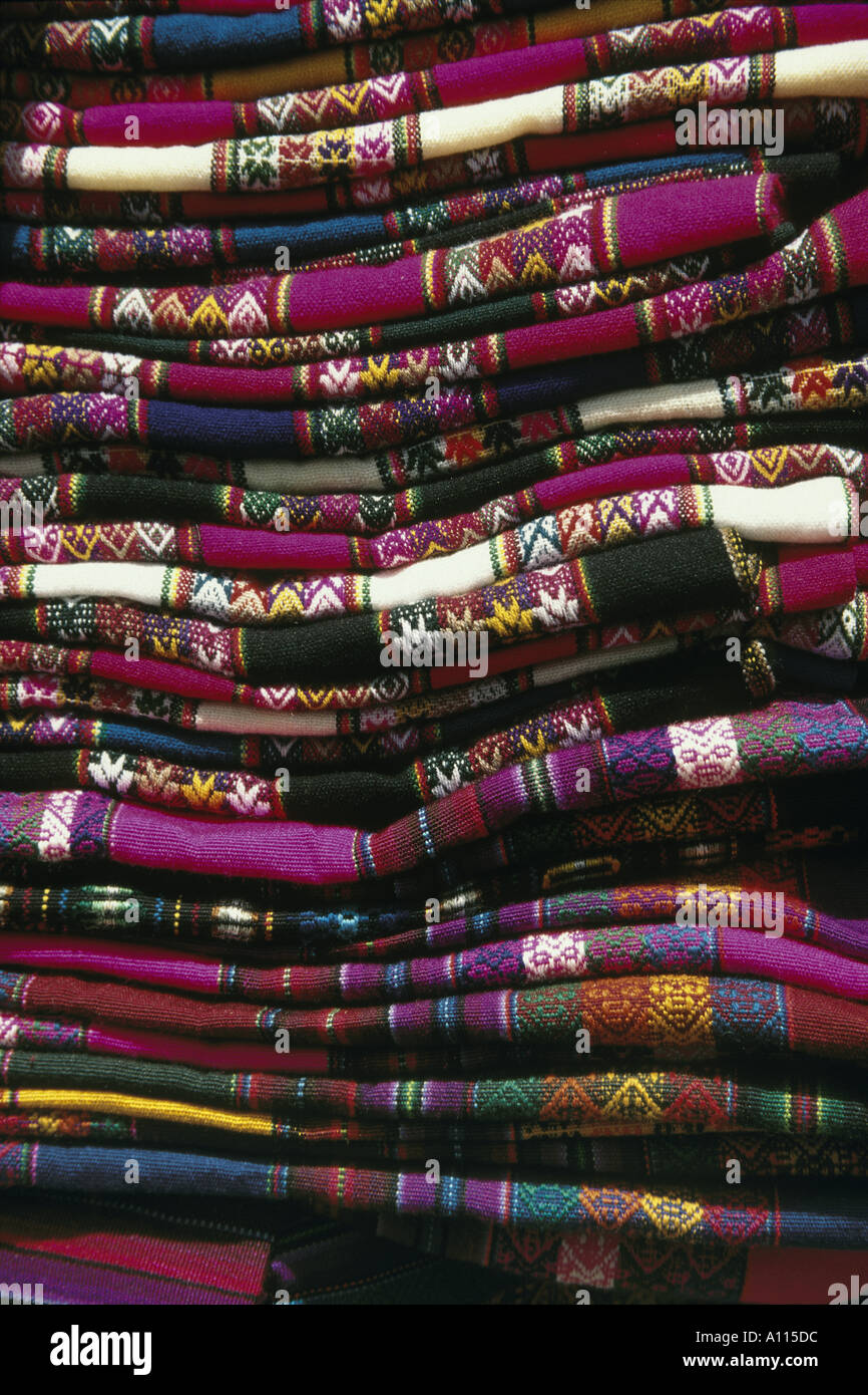 Stacked woven cloths Otavalo Ecuador Stock Photo - Alamy