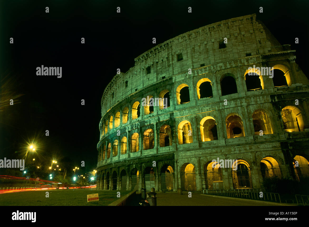 The Colosseum is lit up by night Stock Photo - Alamy