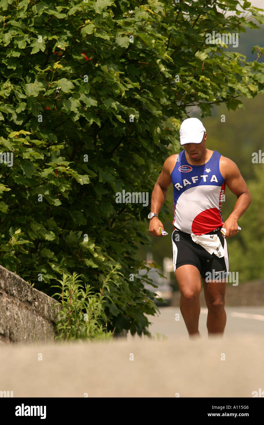 Triathlete running at Bala Middle Distance Triathlon Stock Photo - Alamy
