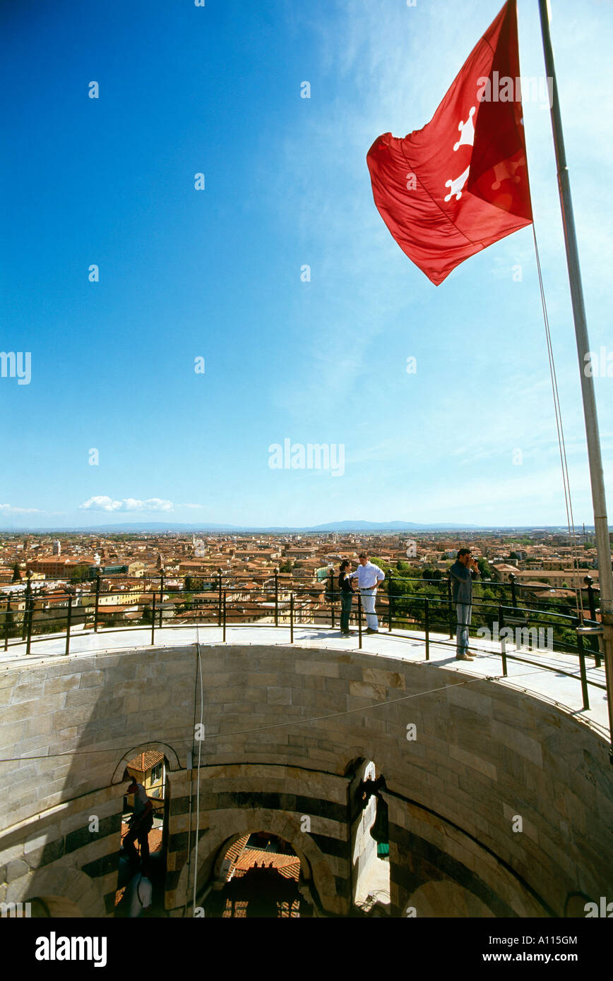 Bell Tower of Leaning Tower of Pisa with a red flag the Pisan Cross ...