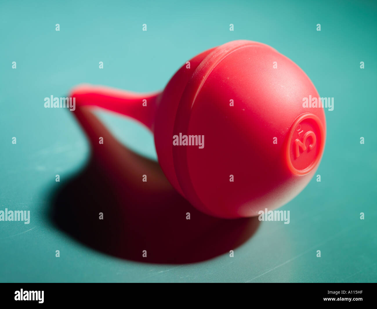 bulb, plastic, rubber, red, round, spout, purge, enema, close up, green ...