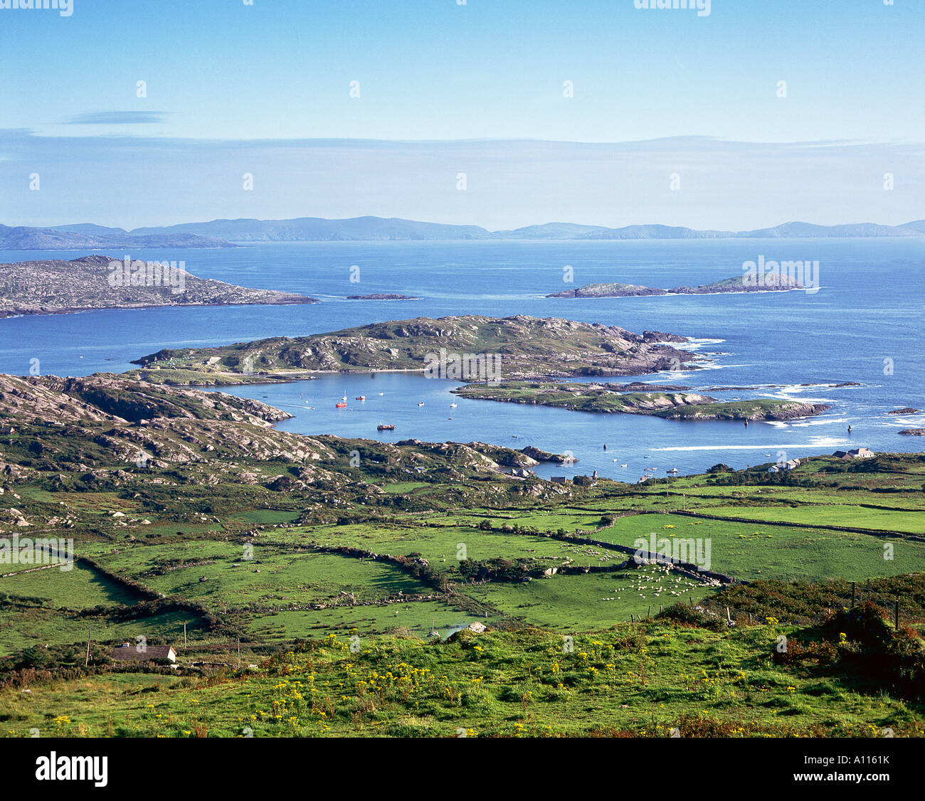 A view from up high of Derrynane and the Ring of Kerry with the sea and ...