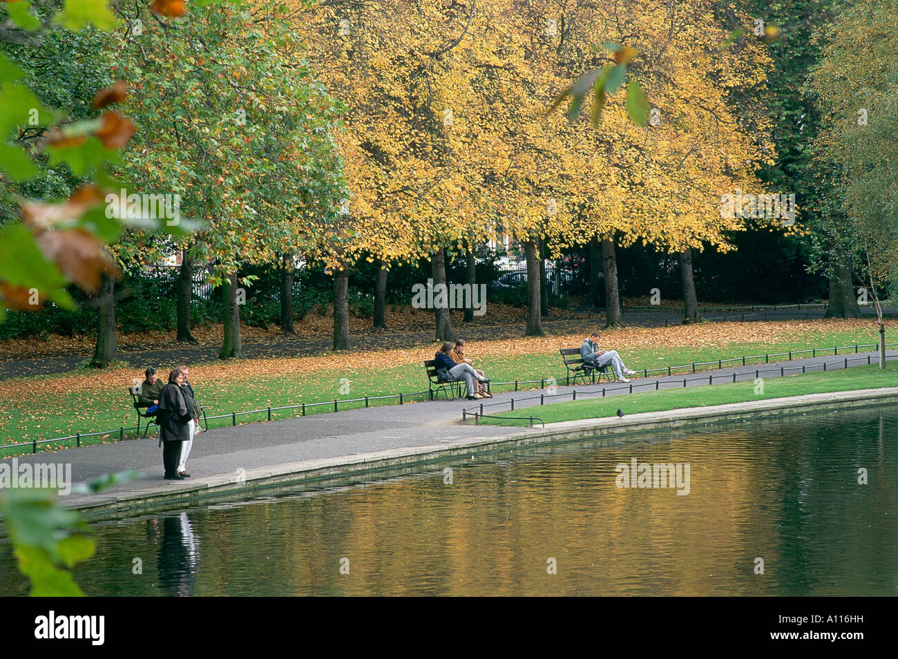 People standing by the duck pond in St Stephen s Green Dublin Stock ...