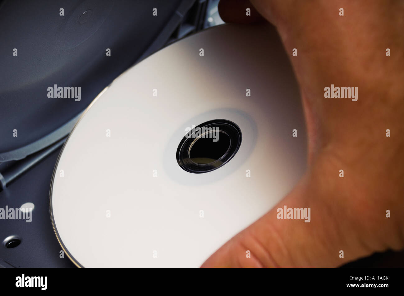 Putting cd cd player hi-res stock photography and images - Alamy
