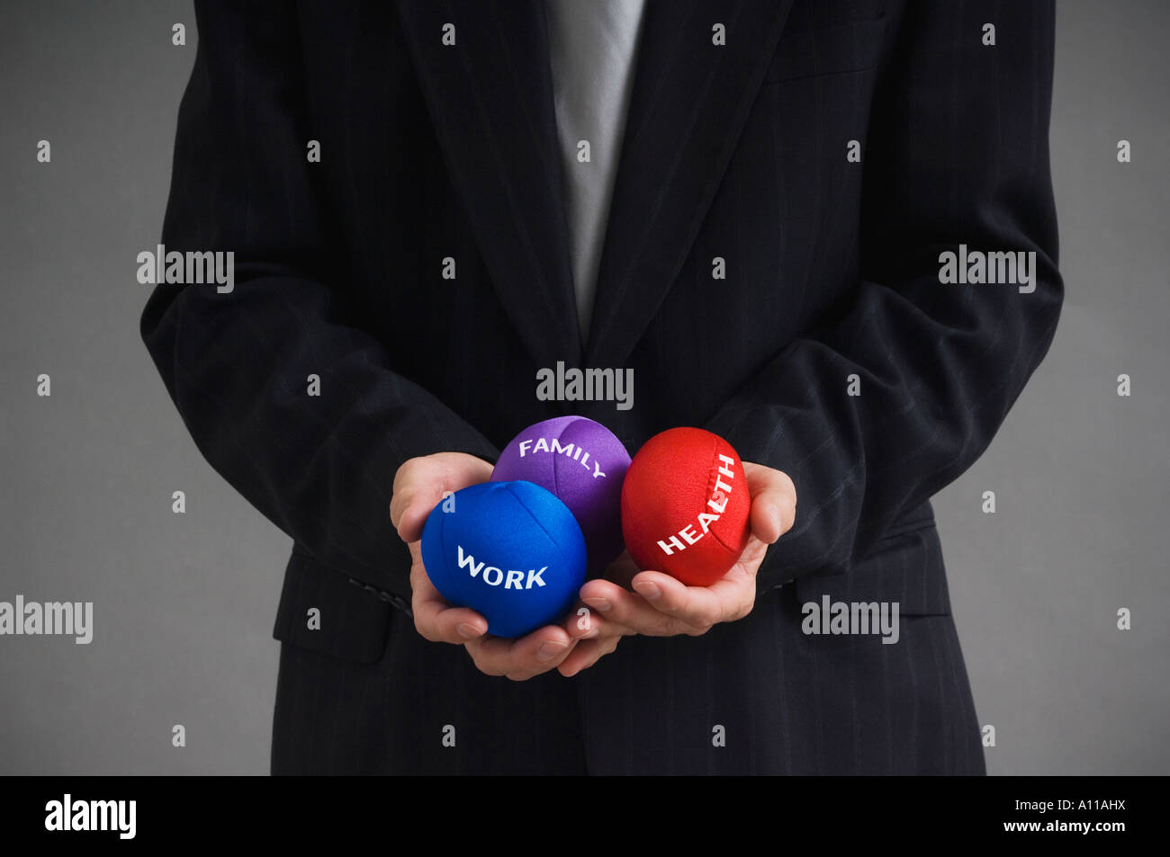 Man with his hands full Stock Photo - Alamy