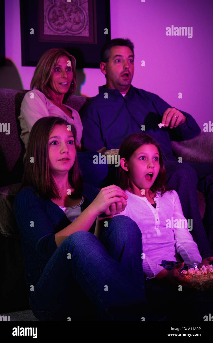Family watching TV Stock Photo - Alamy