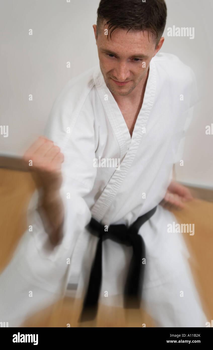 Man practicing martial arts Stock Photo - Alamy
