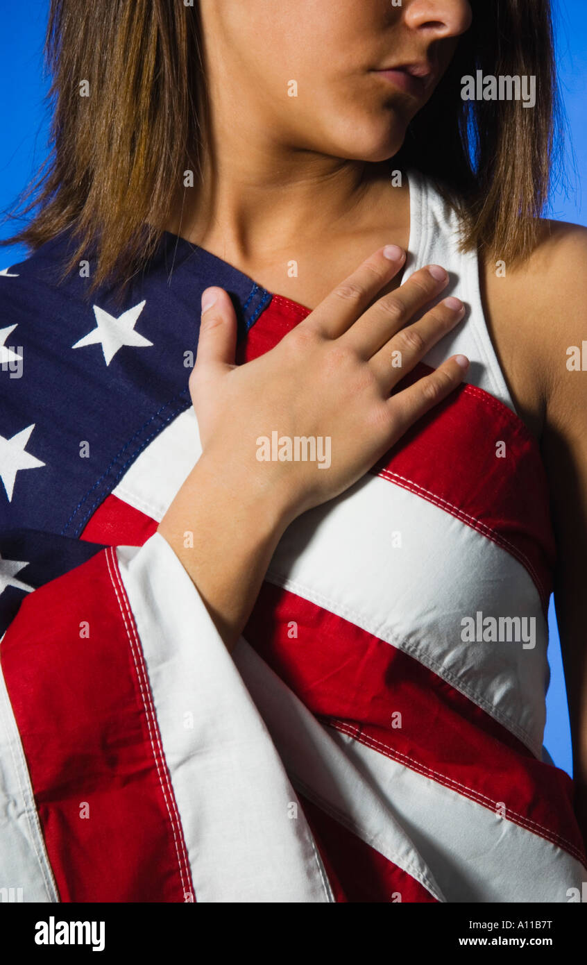 Woman with United States flag wrapped around her Stock Photo - Alamy