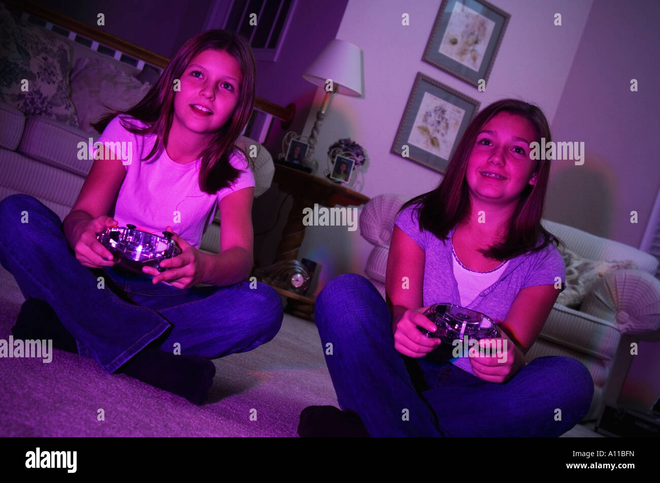 Girls playing games hi-res stock photography and images - Alamy