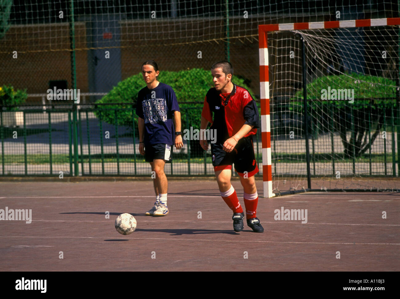 Spaniards, Spanish students, soccer players, playing soccer, campus ...
