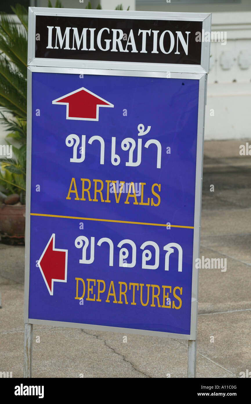 Detail of sign for Immigration Arrivals and Departures written in Thai ...