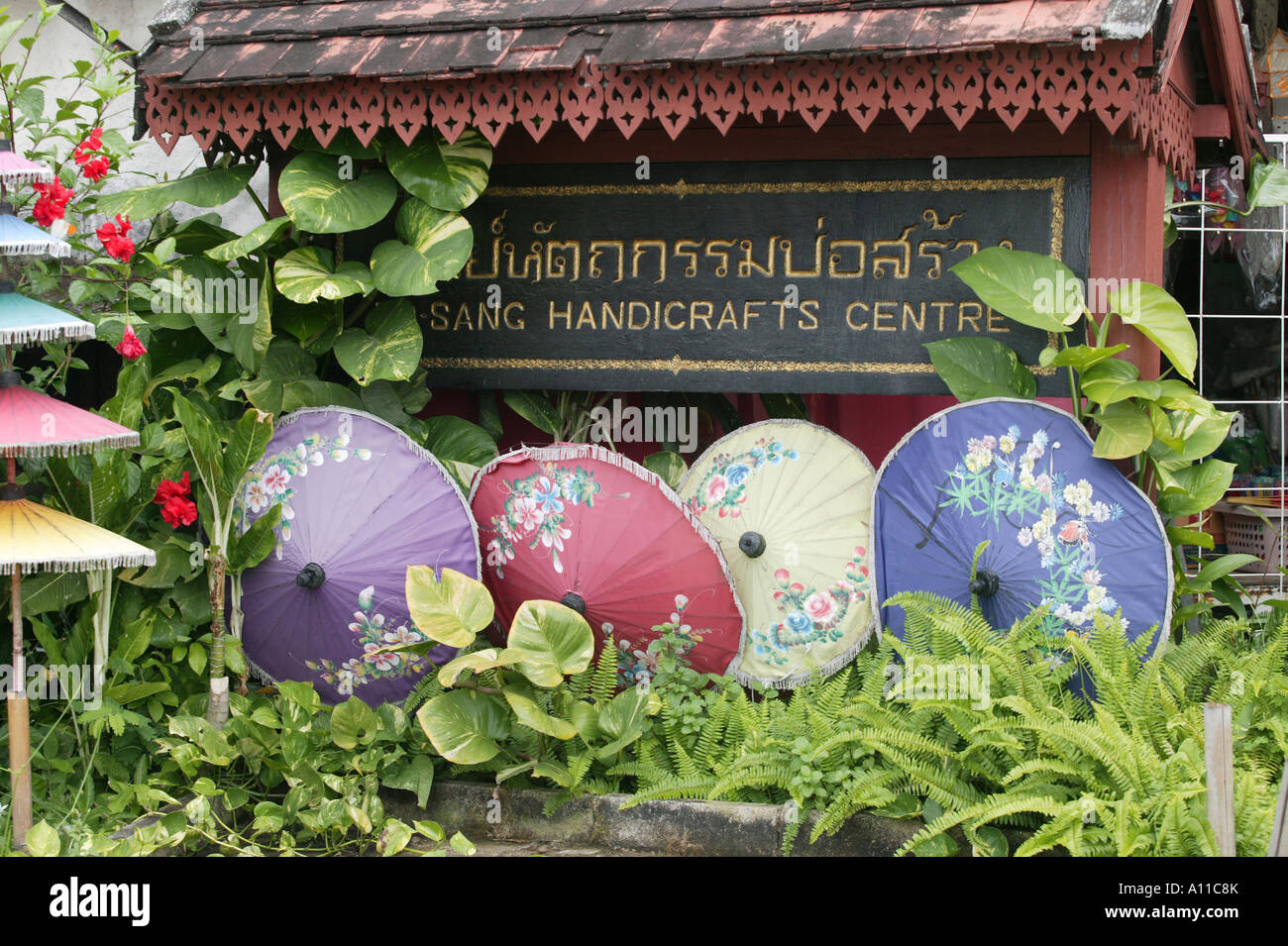 Colourful umbrellas hanging on a wall at the famous Umbrella Centre in ...