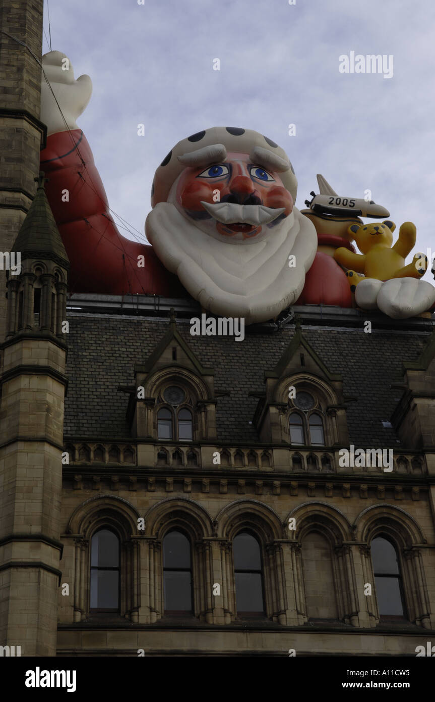 santa claus inflatable manchester town hall roof detail vertical Stock ...