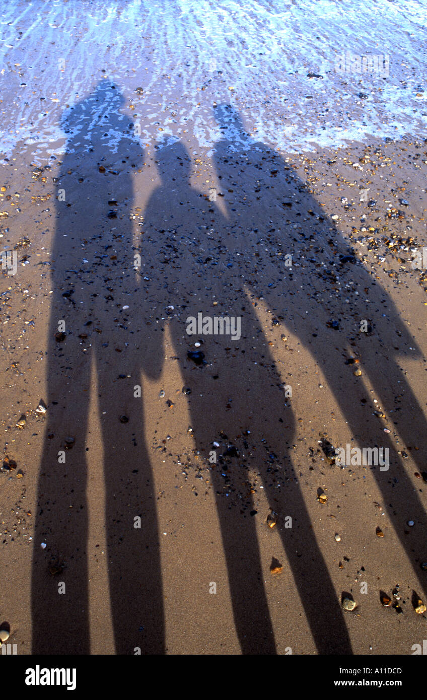 SHADOWS OF FAMILY ON BEACH CROMER NORFOLK EAST ANGLIA ENGLAND UK Stock ...