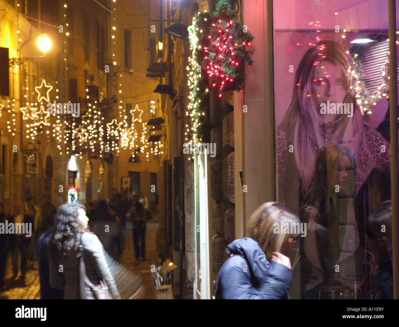 christmas lights by shops in rome Stock Photo - Alamy
