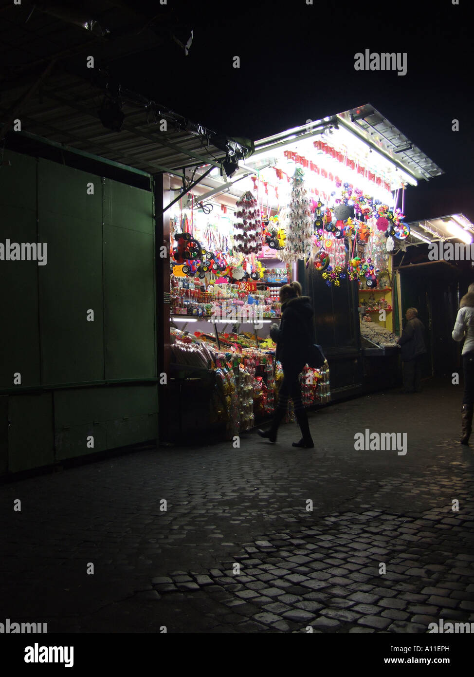 sweet market stall at night Stock Photo - Alamy
