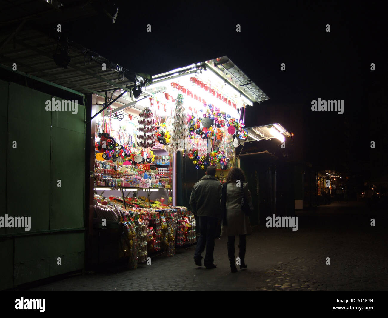 sweet market stall at night Stock Photo - Alamy