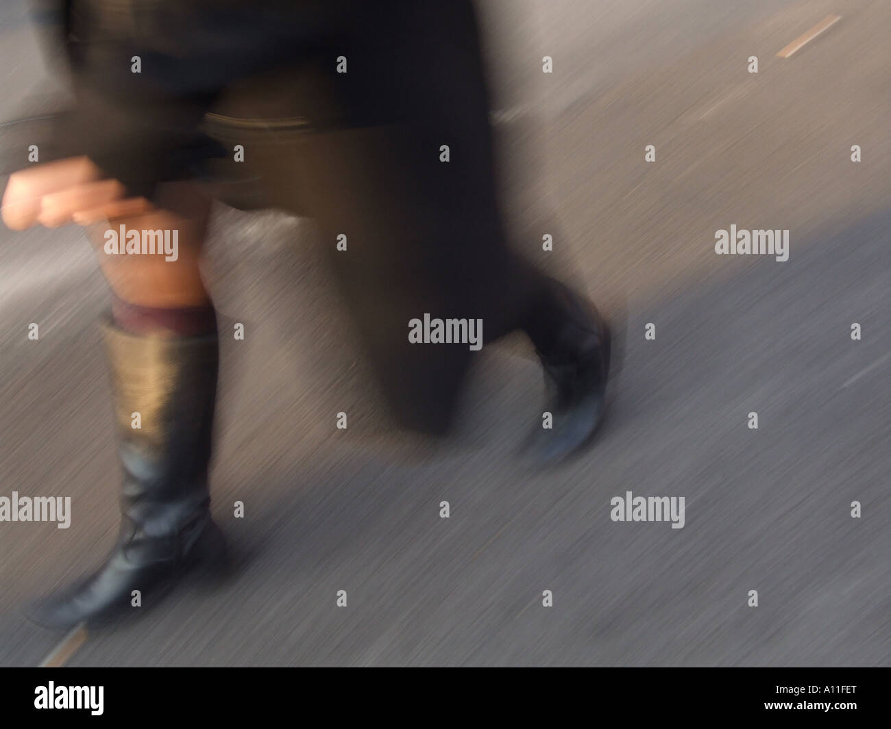 woman in boots running Stock Photo - Alamy