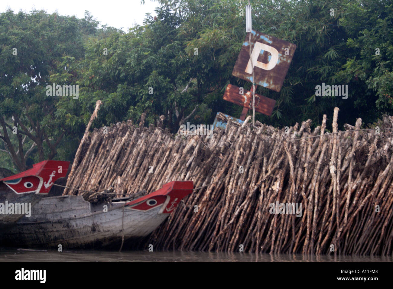 Boats parked on the riverbank, Mekong Delta, Vietnam Stock Photo - Alamy