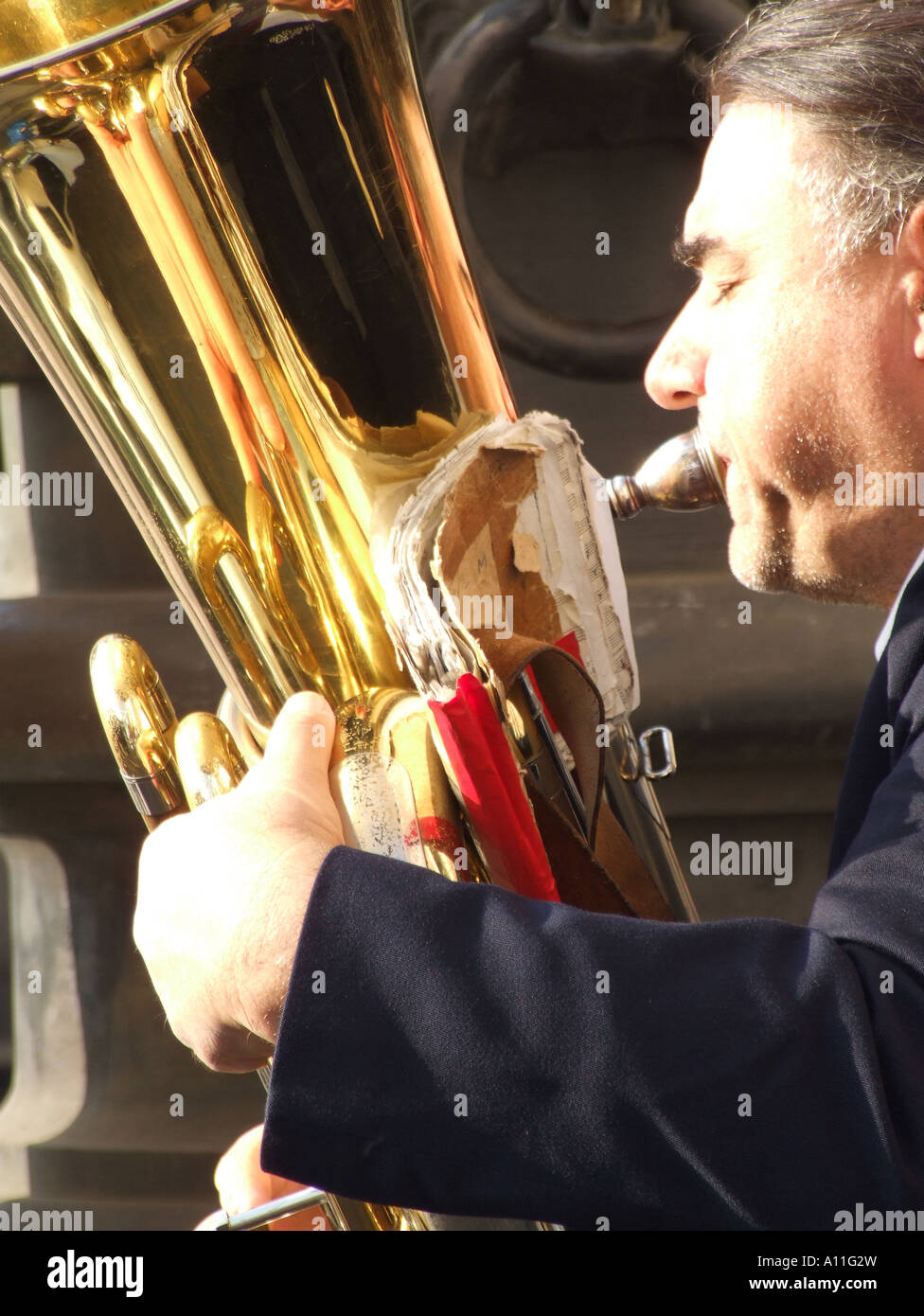 man playing brass instrument in band Stock Photo - Alamy