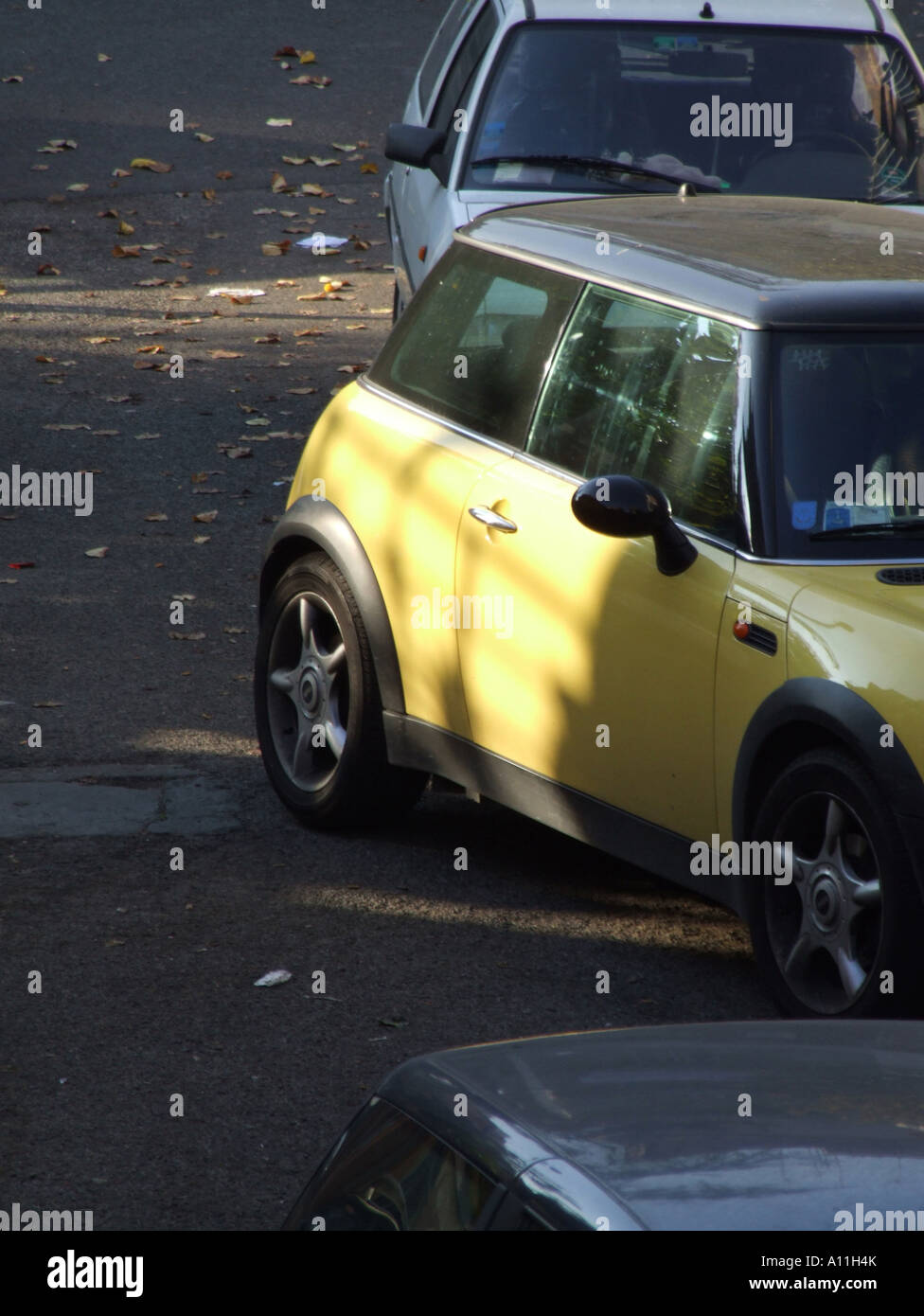 new mini car parked in street Stock Photo - Alamy