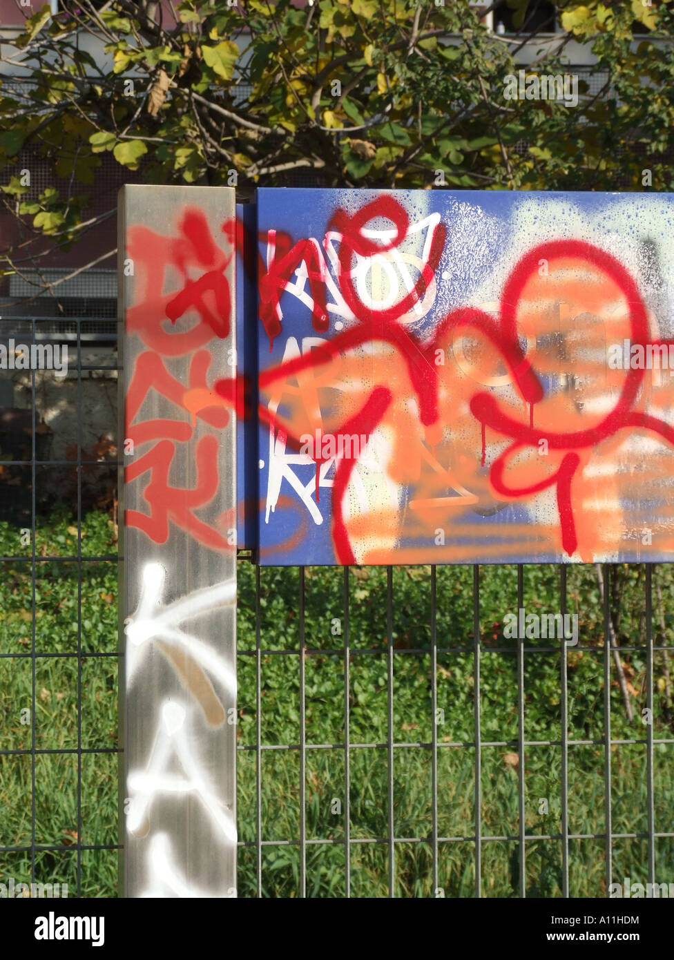 name plate board covered with graffiti Stock Photo - Alamy