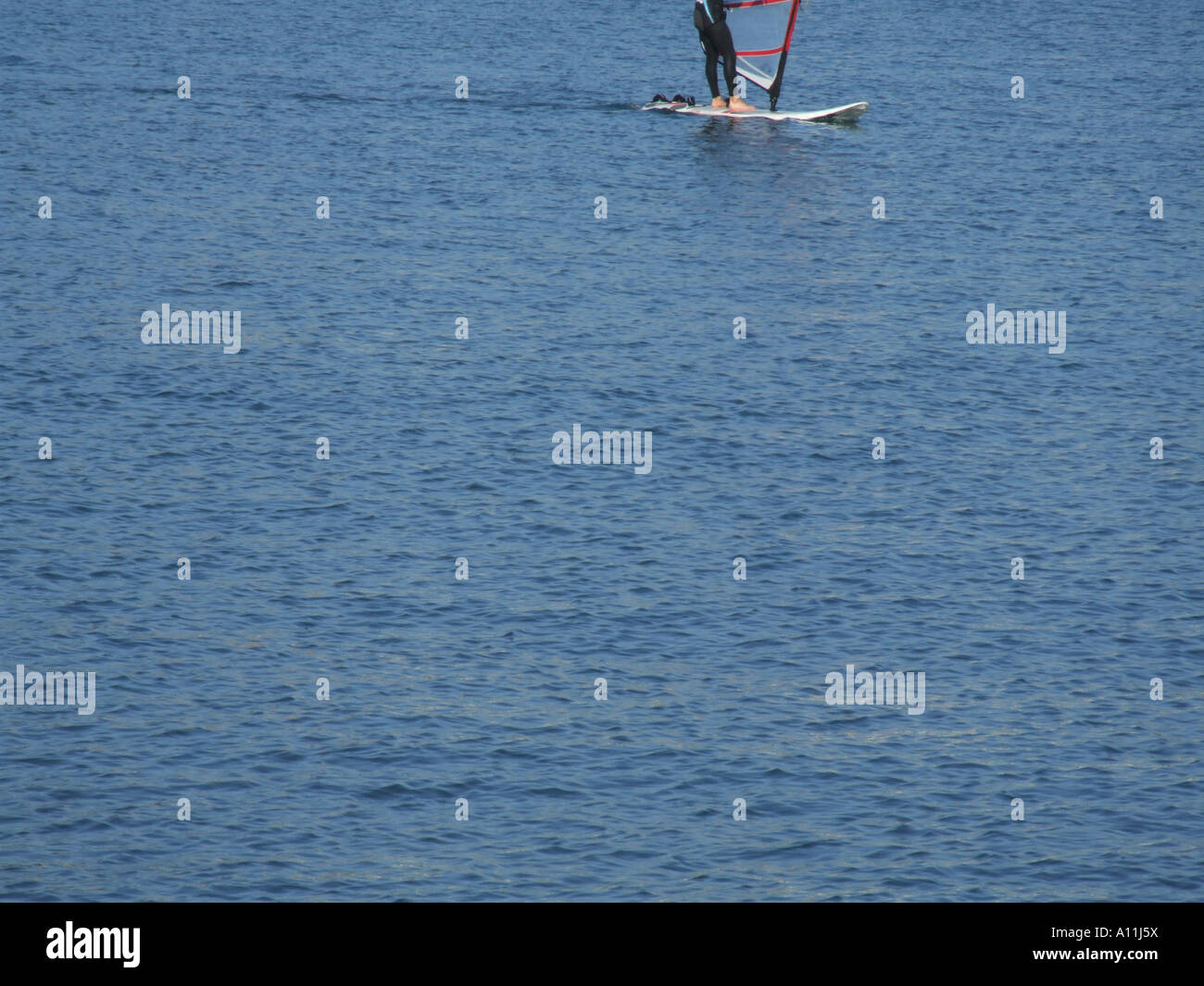 windsurfer at sea Stock Photo - Alamy