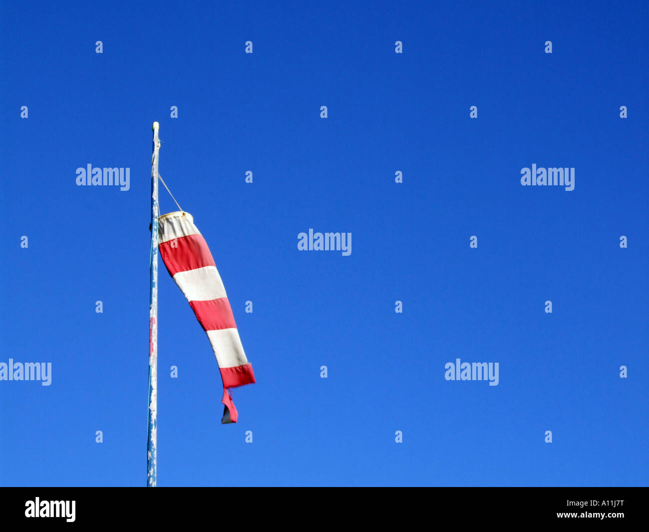 windsock and blue sky Stock Photo - Alamy