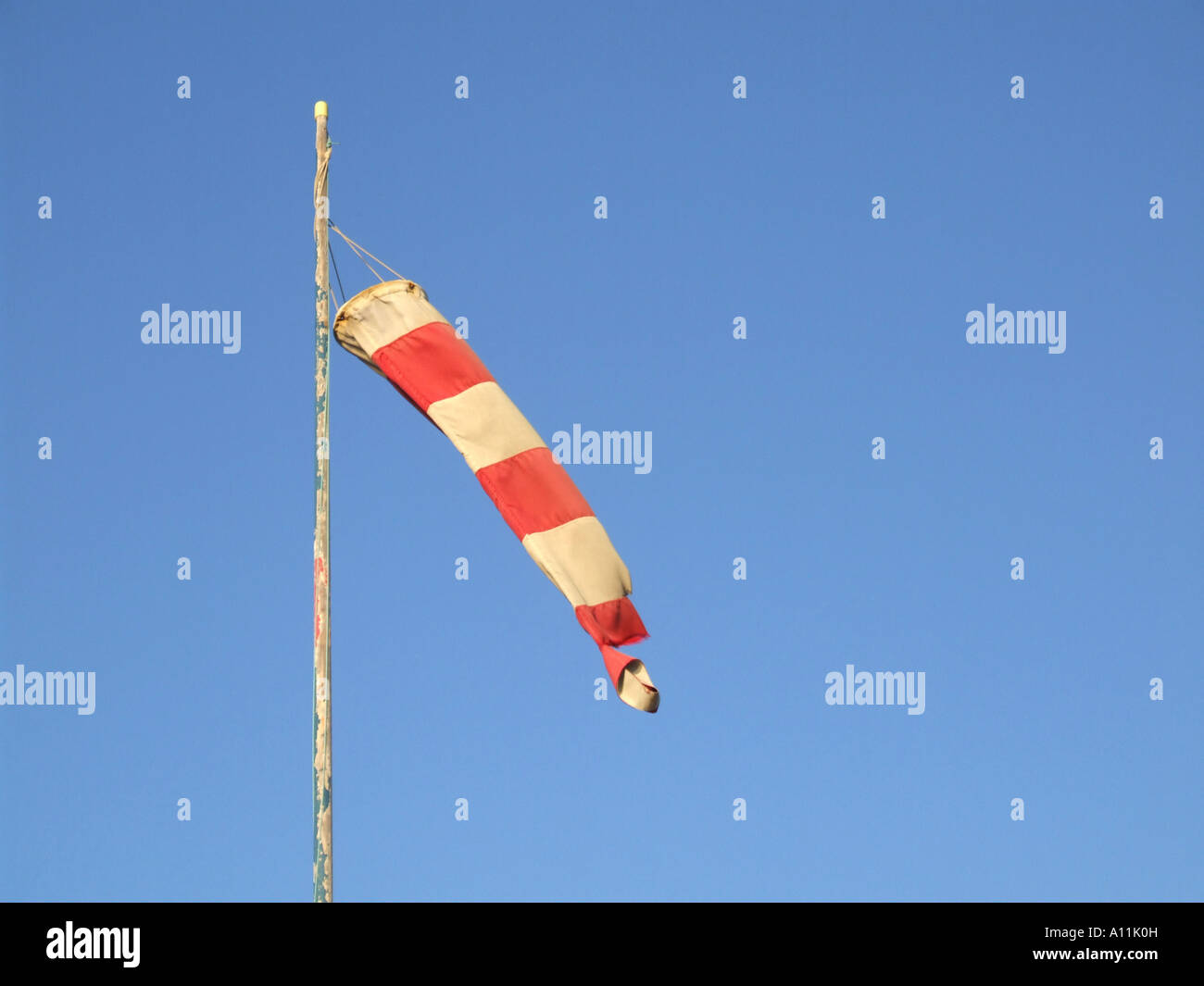 windsock and blue sky Stock Photo - Alamy