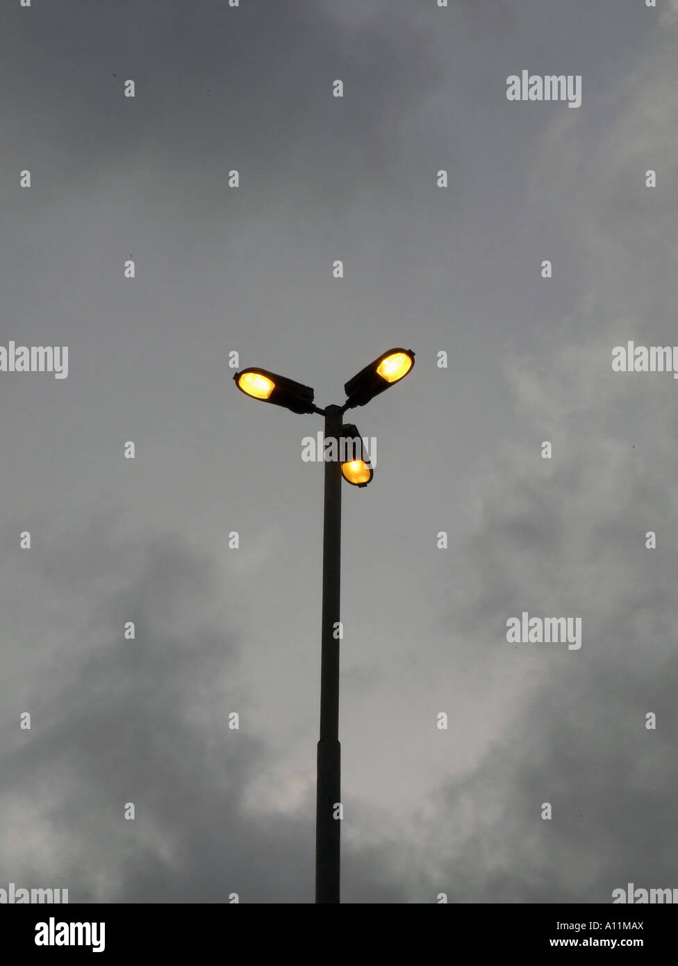 street lighting on and dramatic sky Stock Photo - Alamy