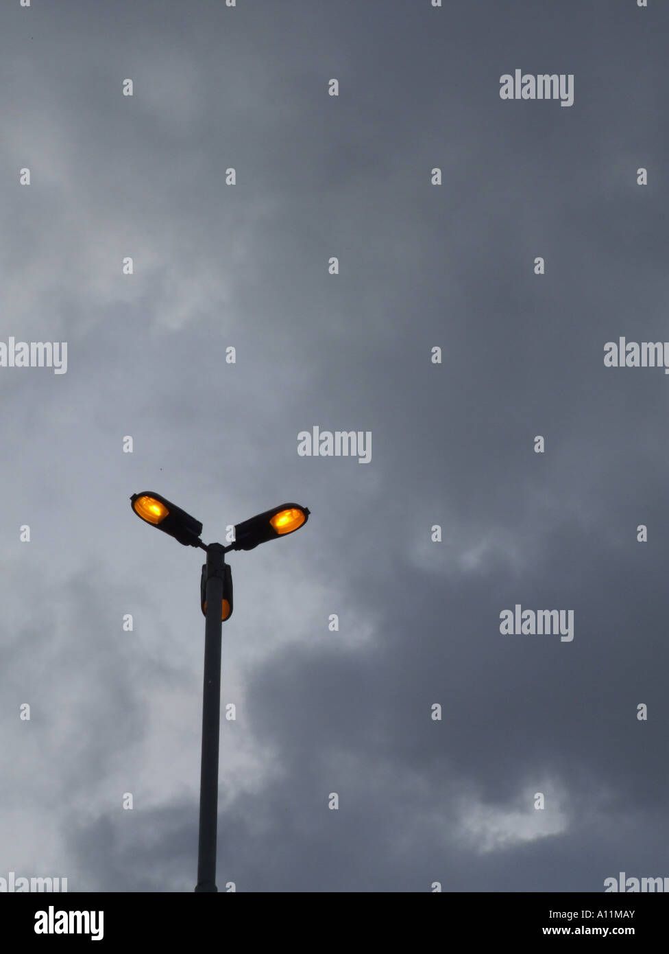 street lighting on and dramatic sky Stock Photo - Alamy