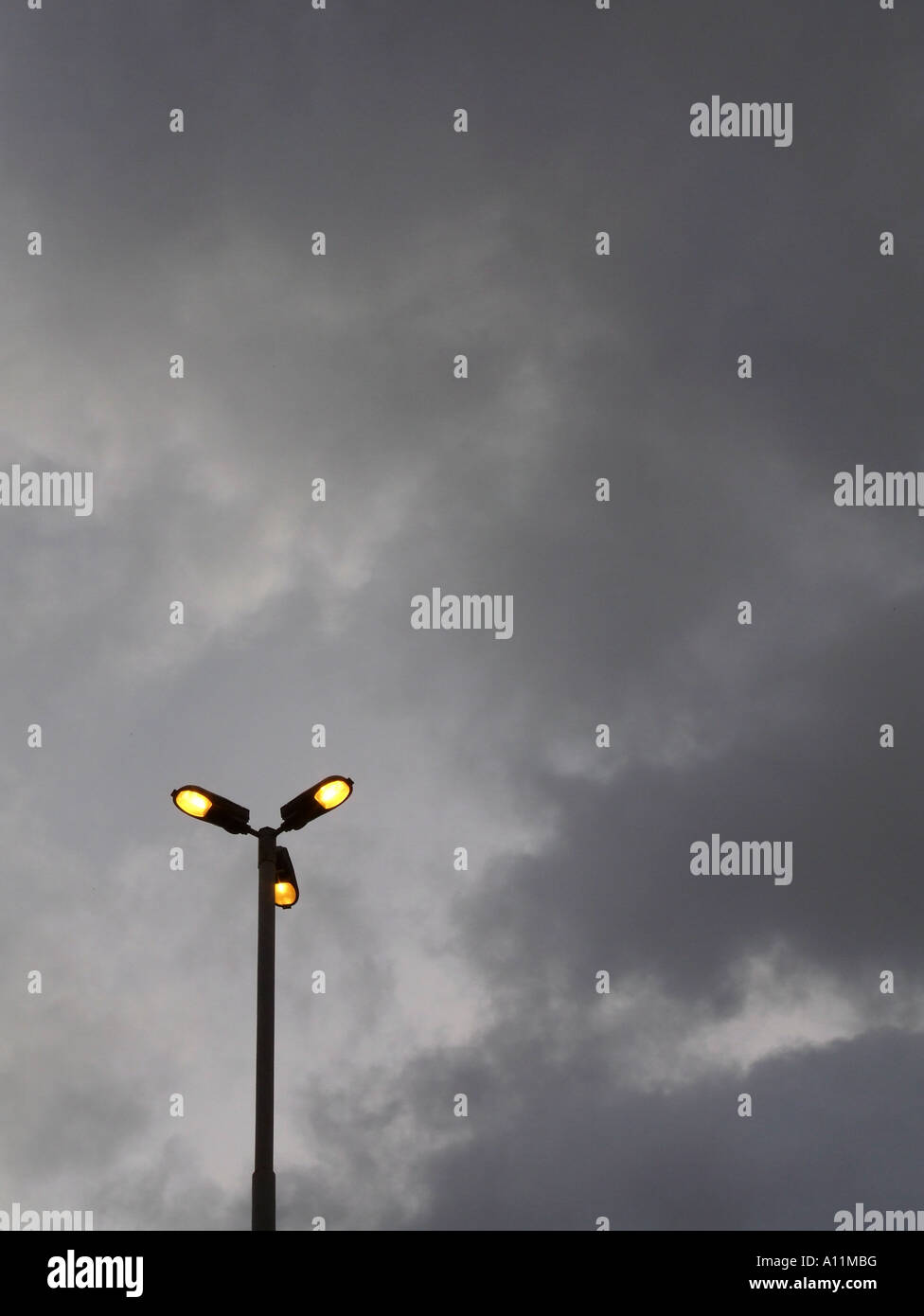 street lighting on and dramatic sky Stock Photo - Alamy