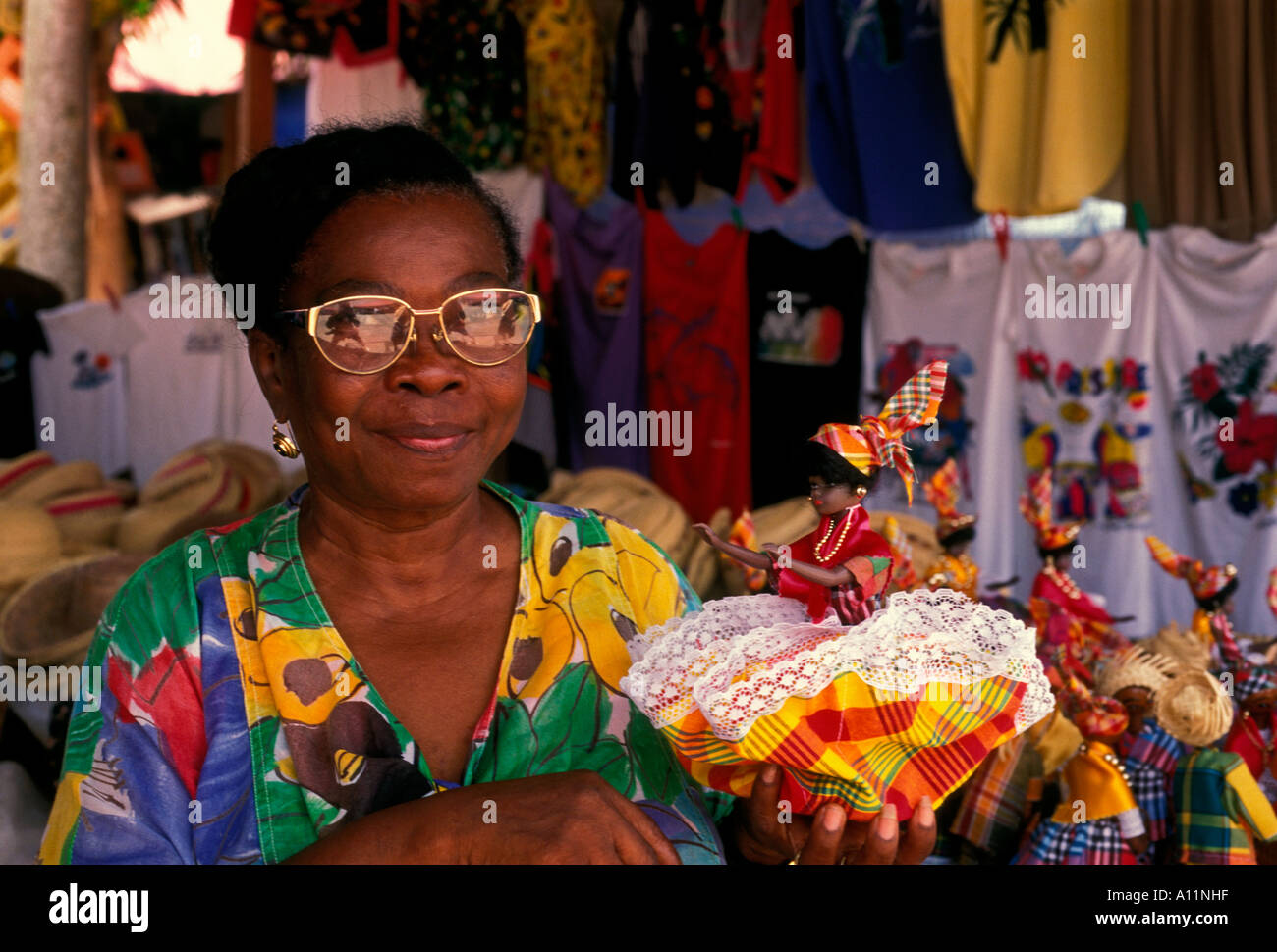 people, vendor, selling dolls, craft market, eye contact, front view ...