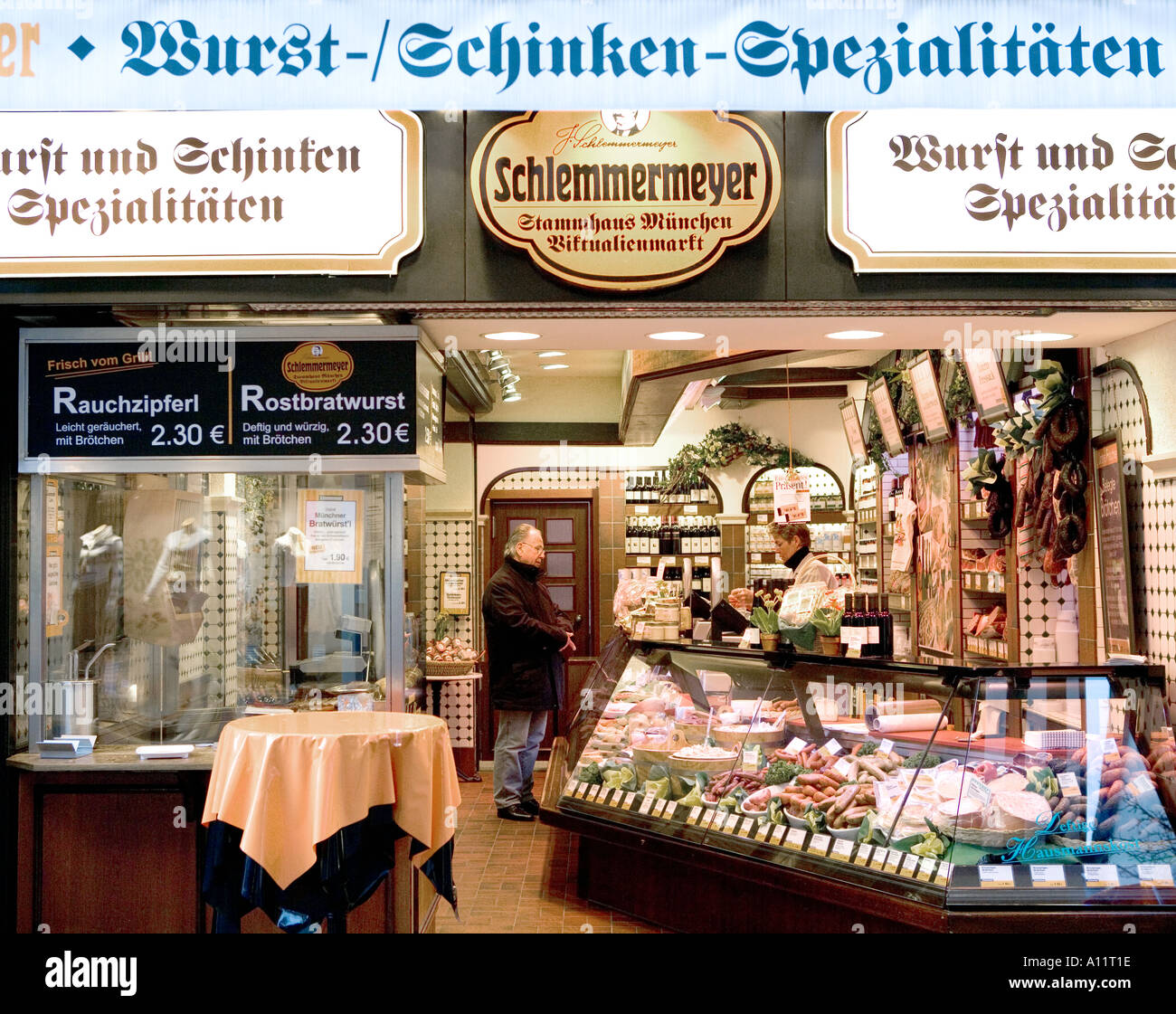 Butchers shop with customer in the Old Town Dusseldorf Germany Stock ...