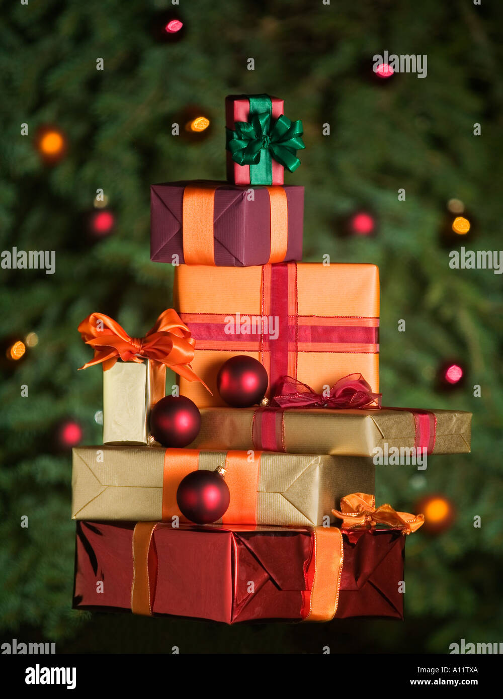 Stack of presents with christmas tree Stock Photo - Alamy