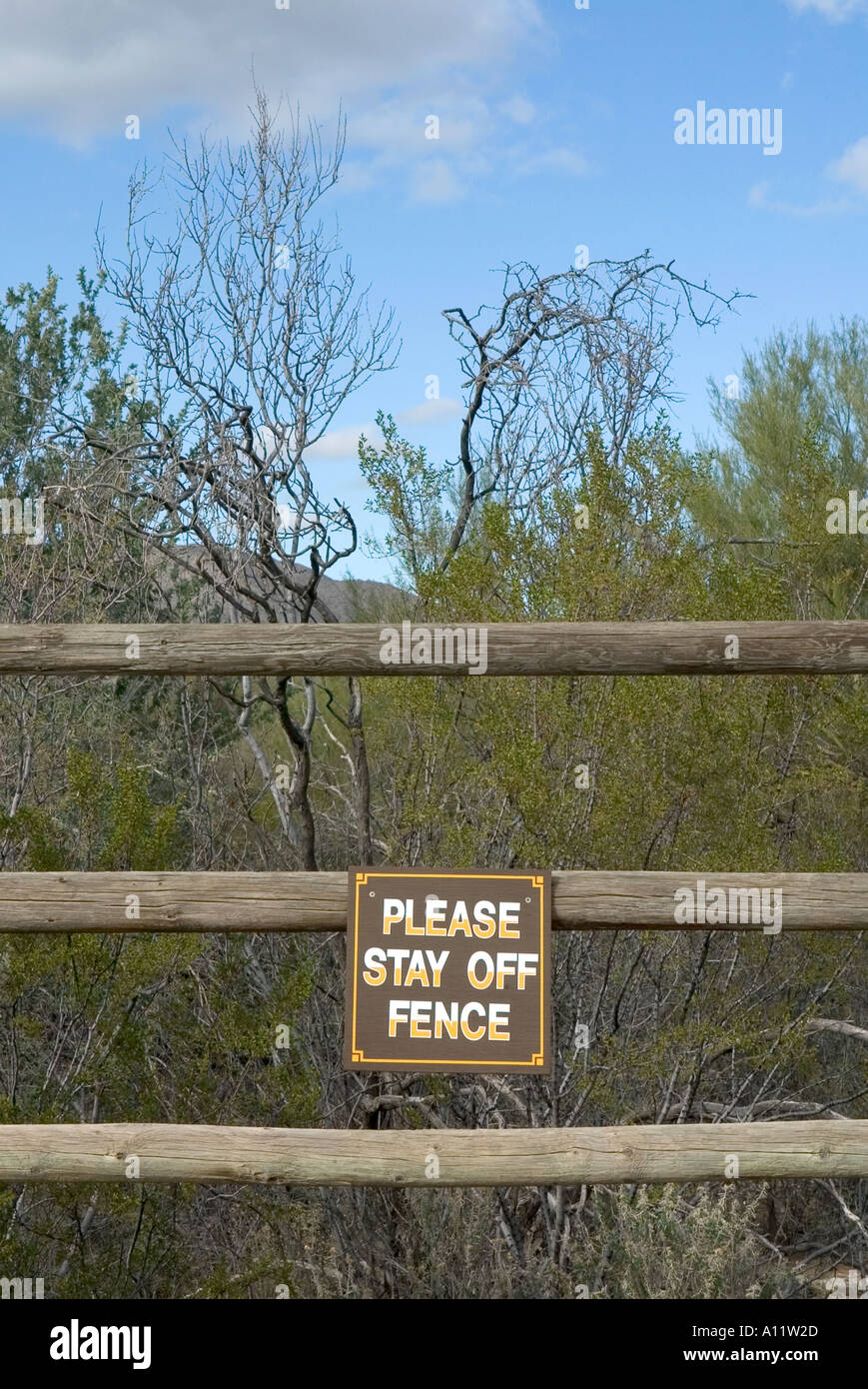 Please stay off the fence sign Stock Photo - Alamy