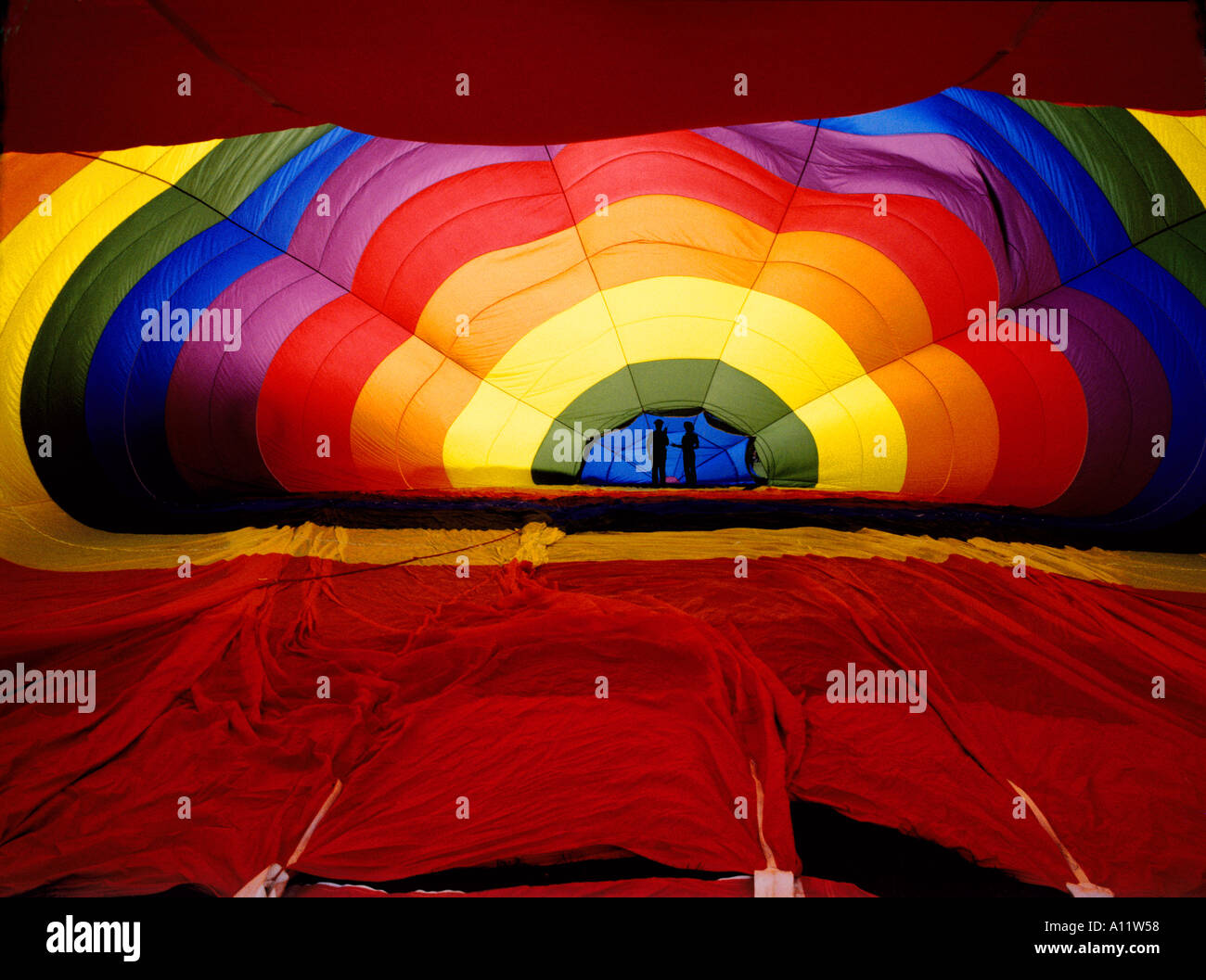 Two people inside an inflating hot air Balloon Stock Photo - Alamy