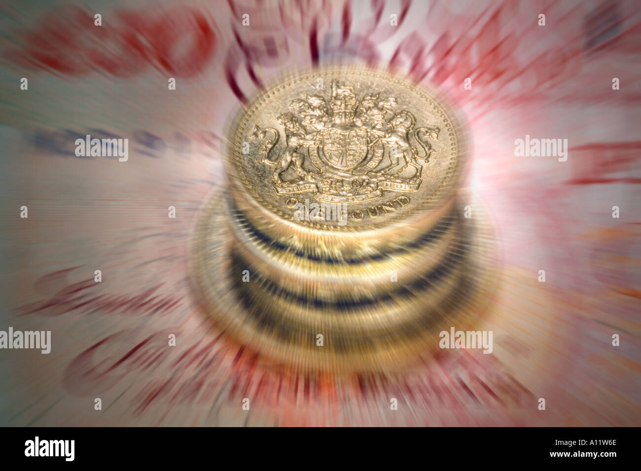 Pile of 1 one British pound coins on 50 bank note Stock Photo - Alamy