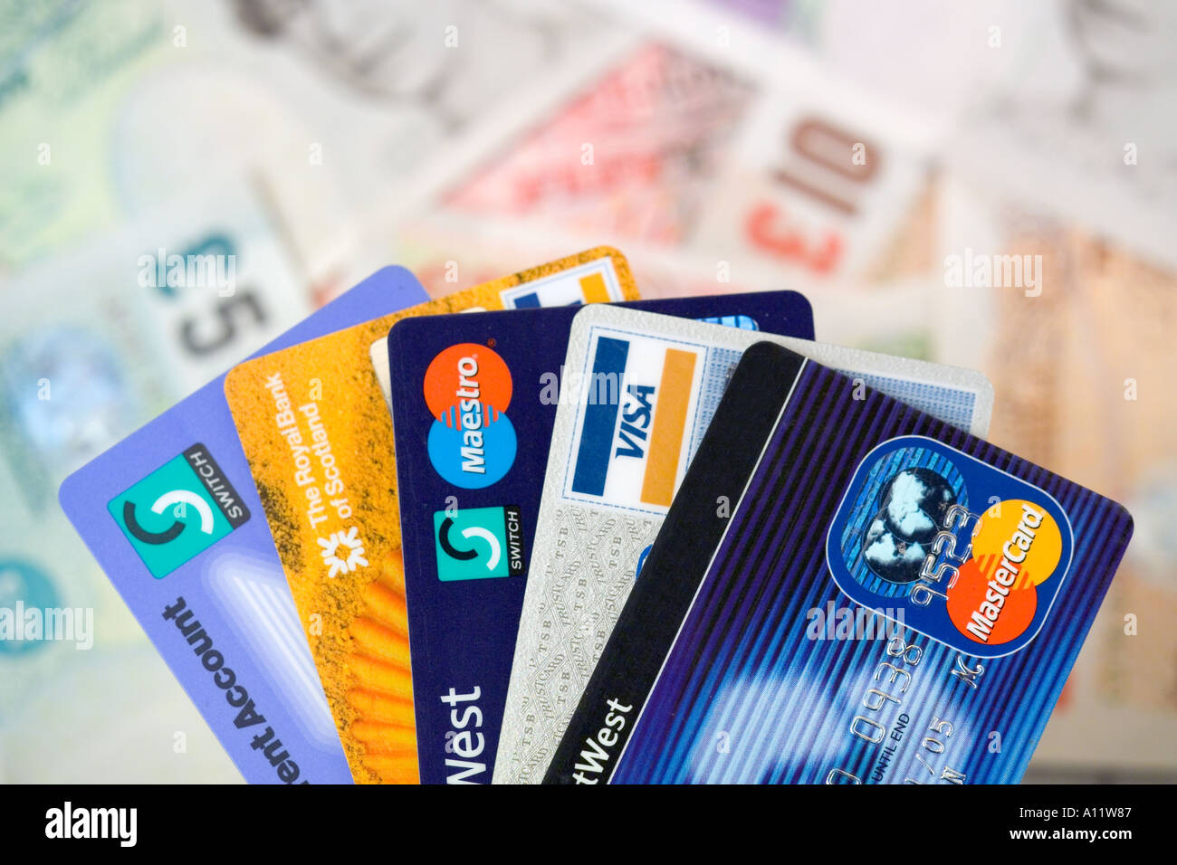 British UK credit cards over English bank notes Stock Photo, Royalty ...