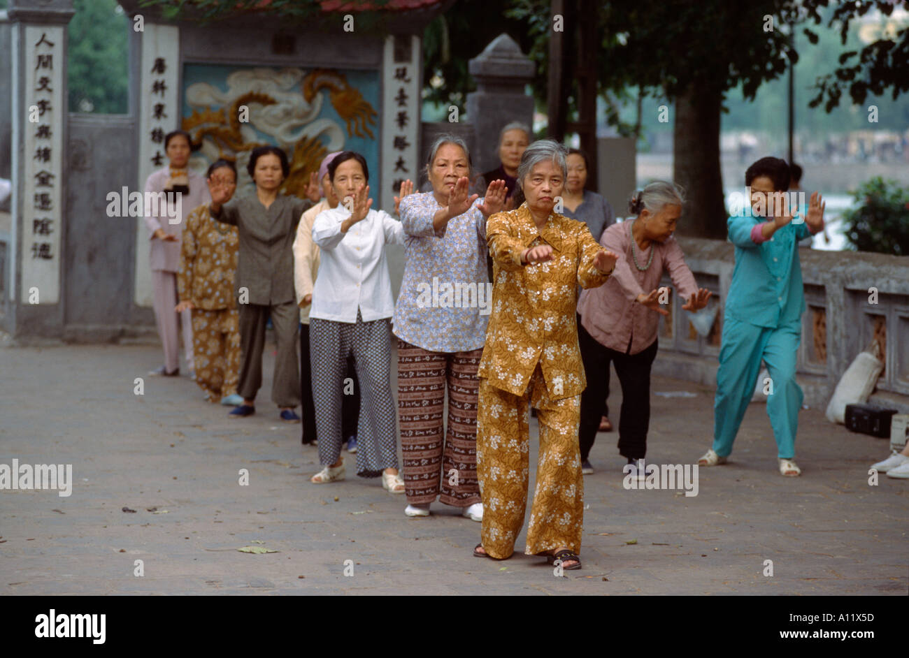 Old women practising Tai Chi outside of Den Ngoc Son Temple, Hoan Kiem ...