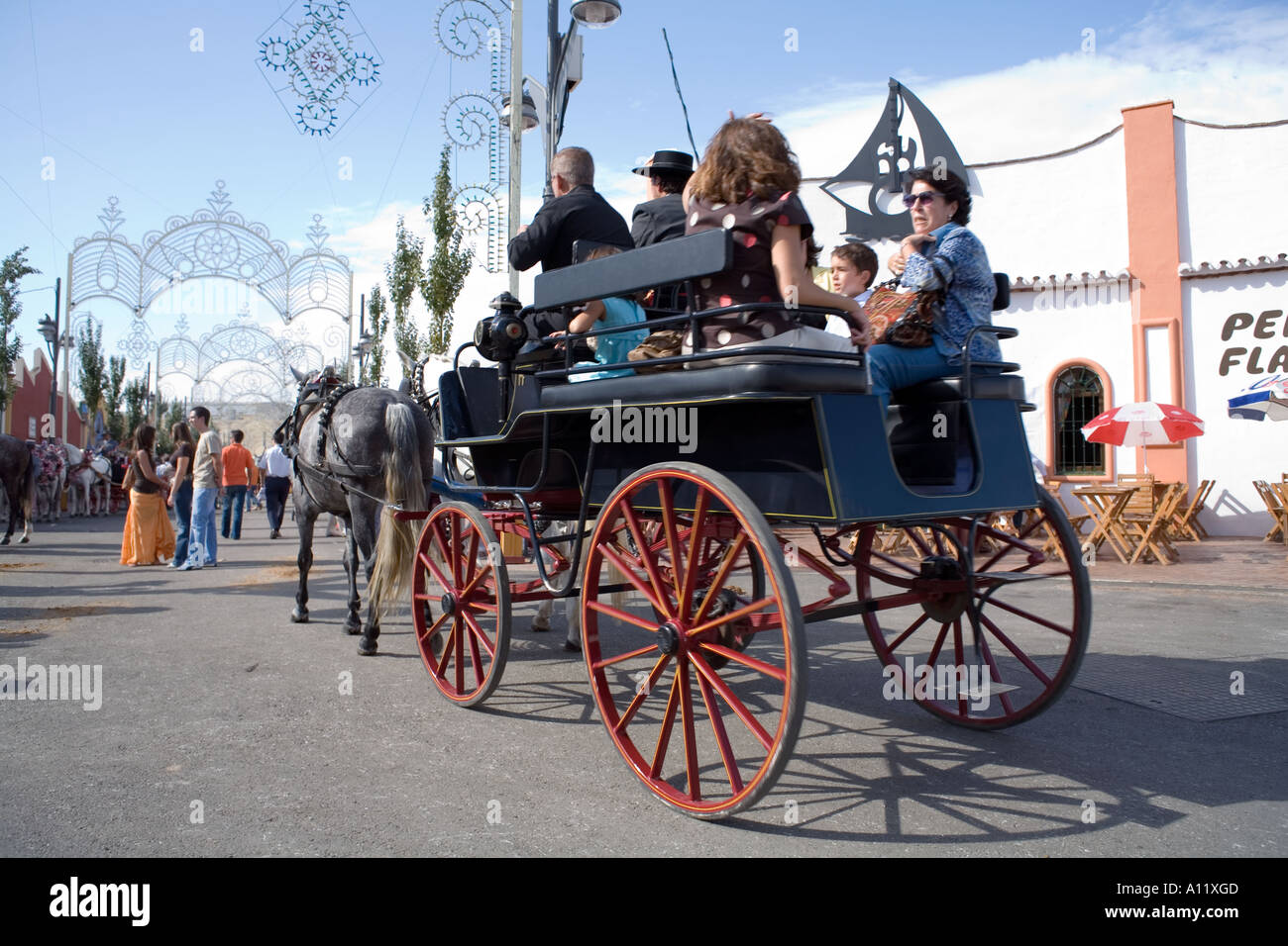 Spanish Family in Traditional Costume ride in Pony Trap at the ...