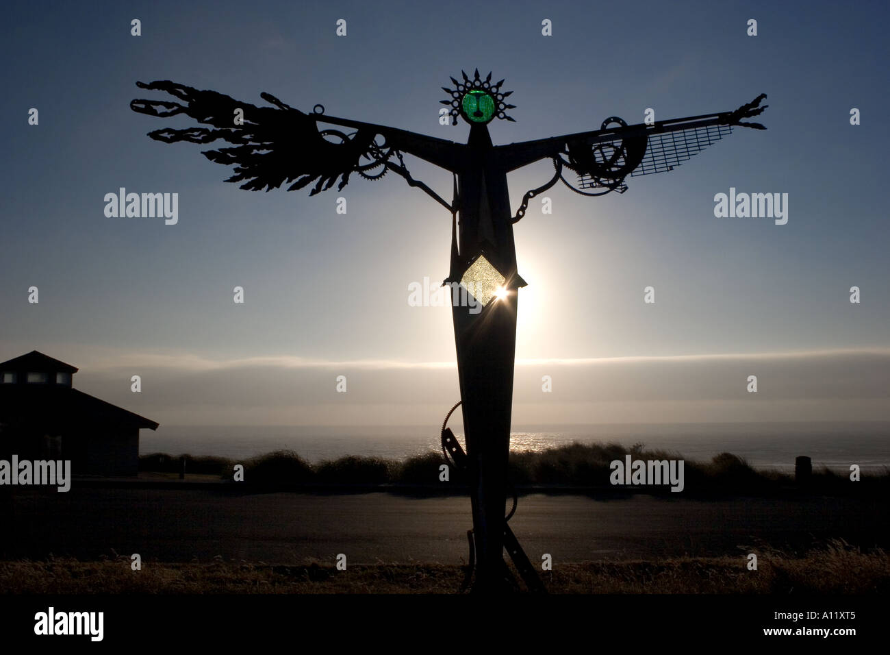 Silhouette of metal and glass sculpture on the Oregon coast Stock Photo ...